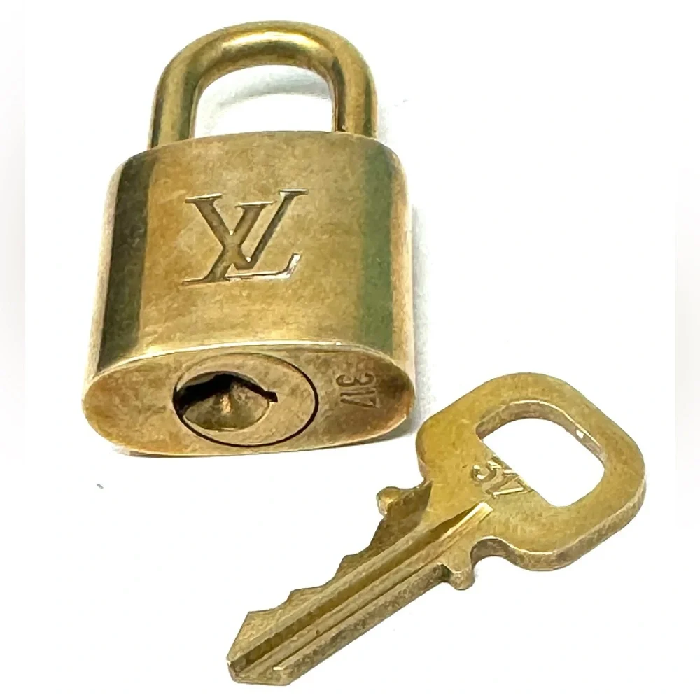 Louis Vuitton | Accessories | Authentic Louis Vuitton Gold Lock Key ...